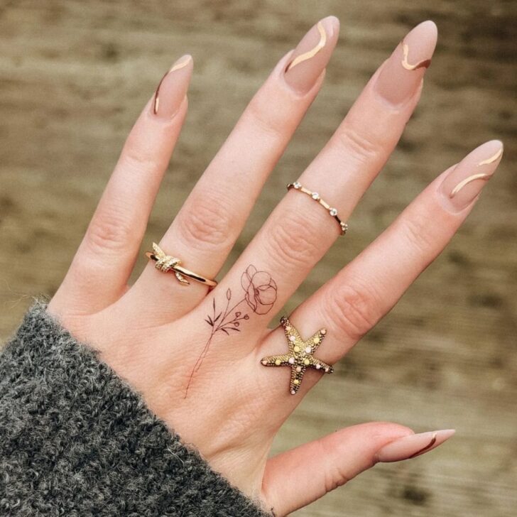 17 Dainty Hand Tattoos for Women that are Trending in 2025